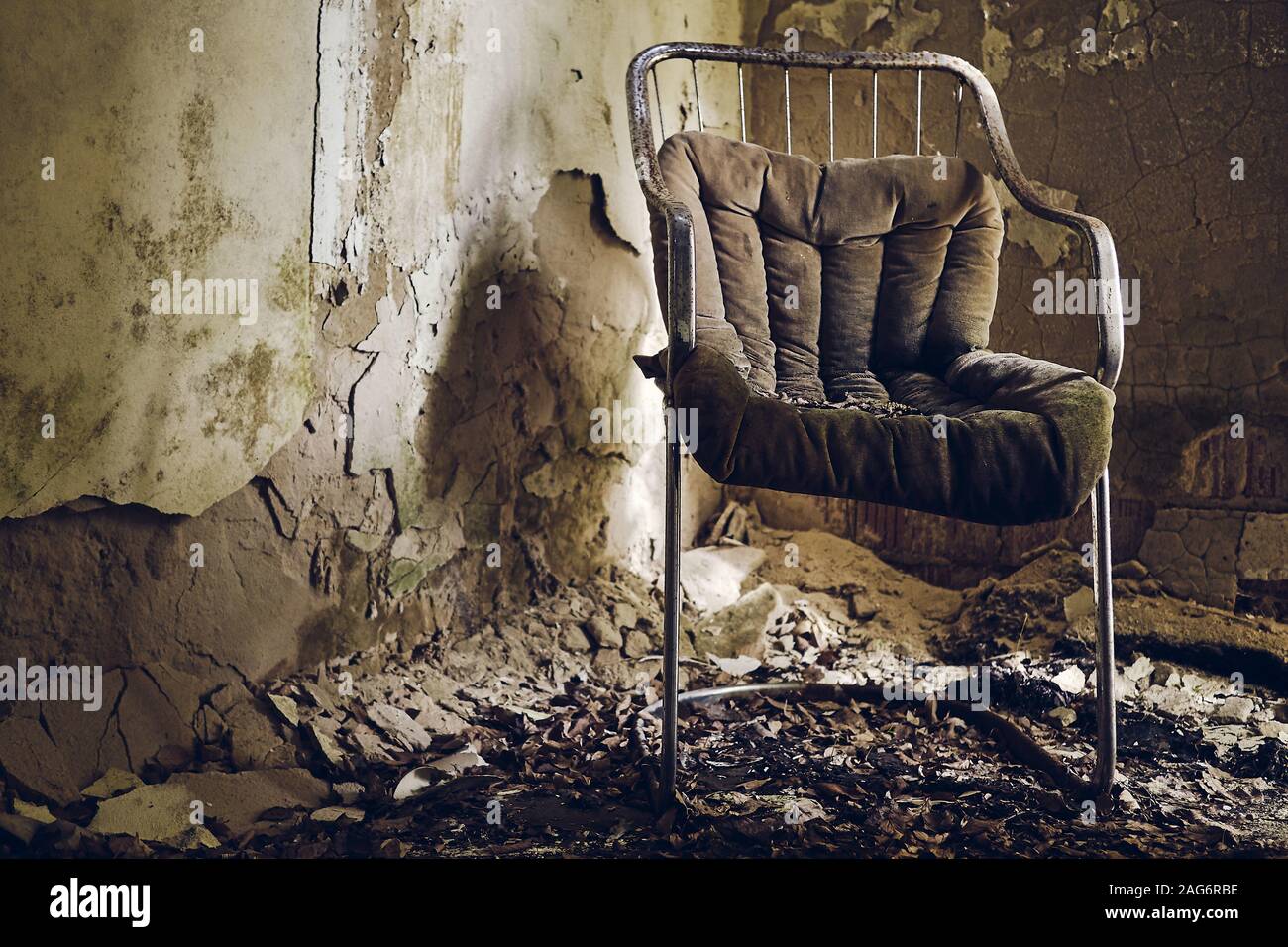 Single chair inside a ruined building with nobody - disaster after ...