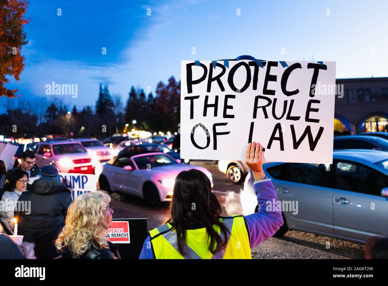 Raised placard hi-res stock photography and images - Alamy