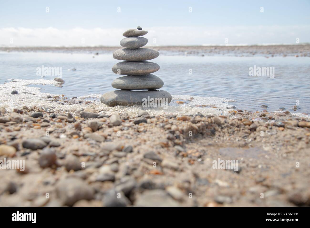 Beautiful shot of a stack of rocks on the beach - business stability ...