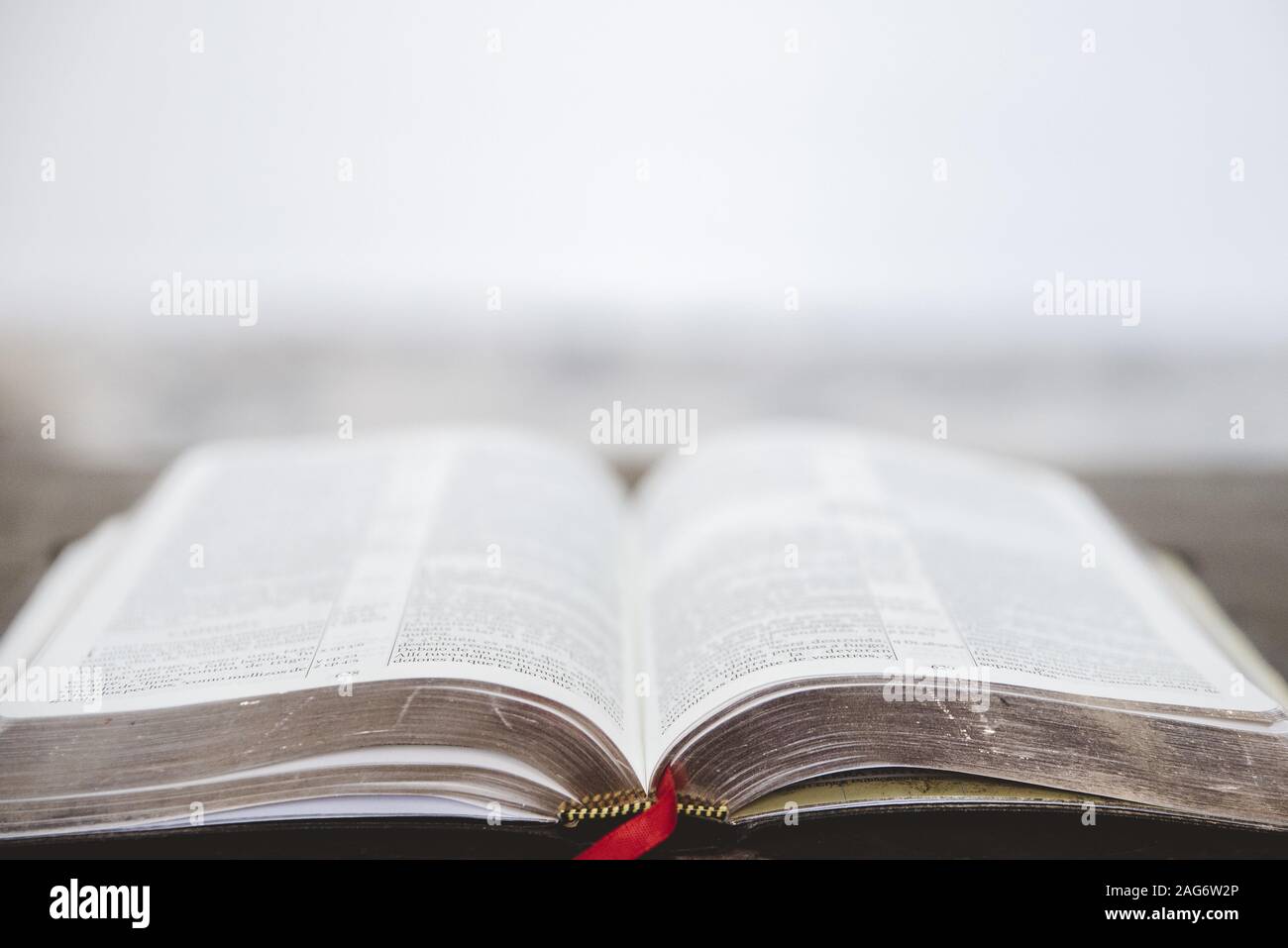 Closeup shot of an open bible with a blurred background Stock Photo - Alamy