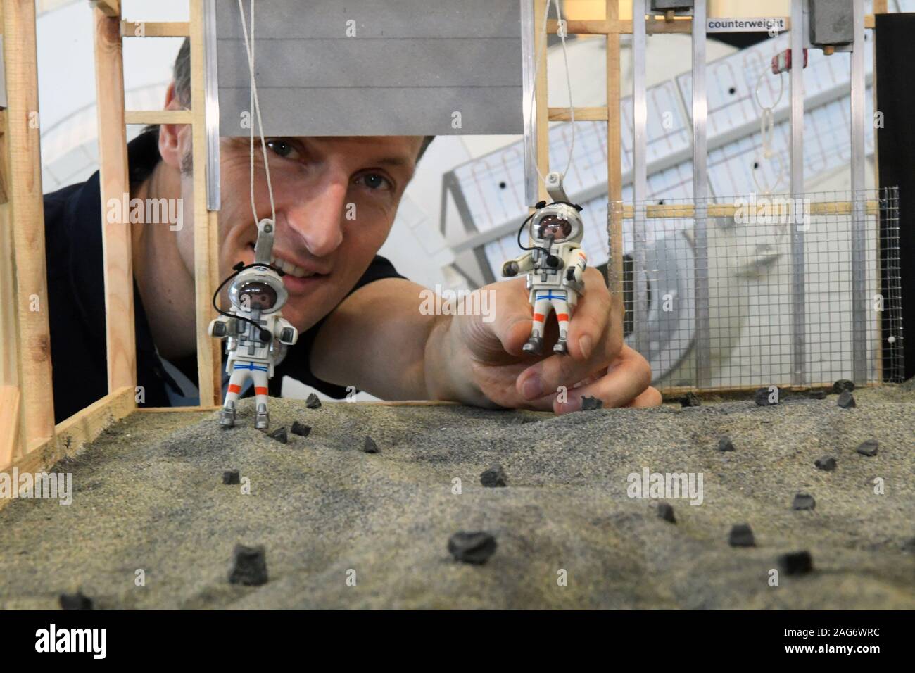 Cologne, Germany. 10th Dec, 2019. Astronaut Matthias Maurer observes ...