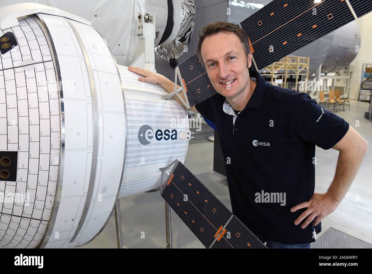 Cologne, Germany. 10th Dec, 2019. Astronaut Matthias Maurer stands next ...