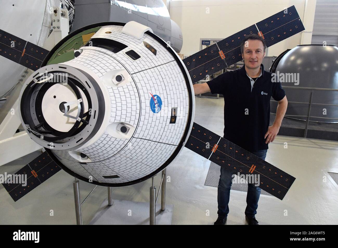 Cologne, Germany. 10th Dec, 2019. Astronaut Matthias Maurer stands next ...