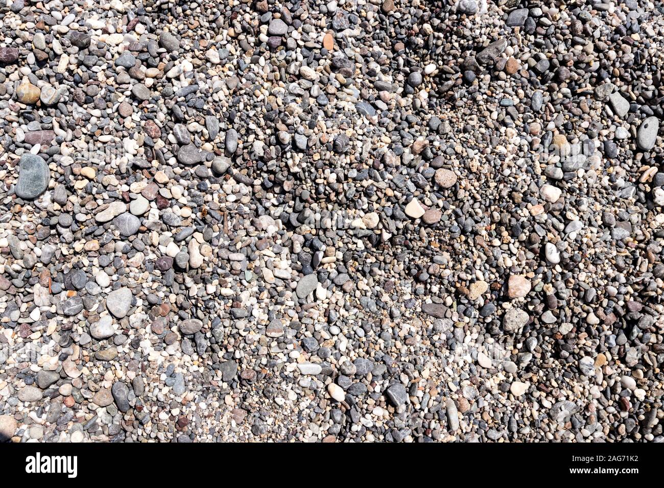 Sandy beach background. Detailed sand or gravel texture Stock Photo - Alamy