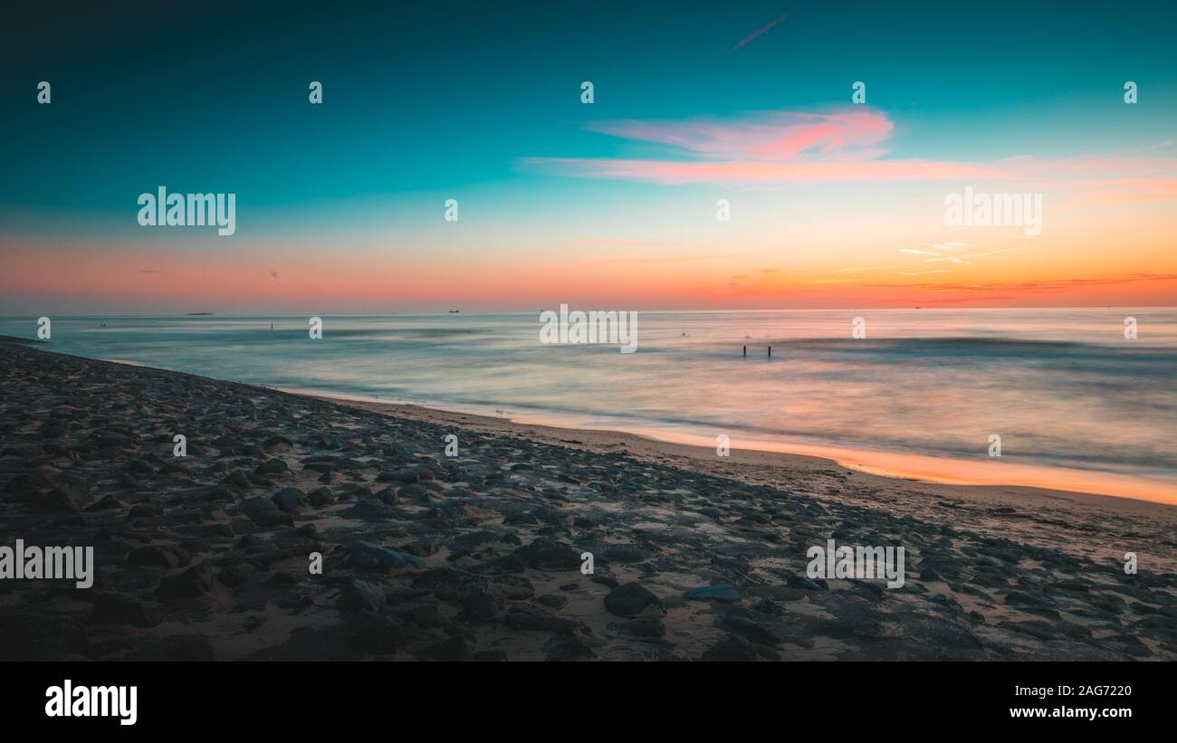Magnificent view of the ocean at sunset captured in Zeeland ...