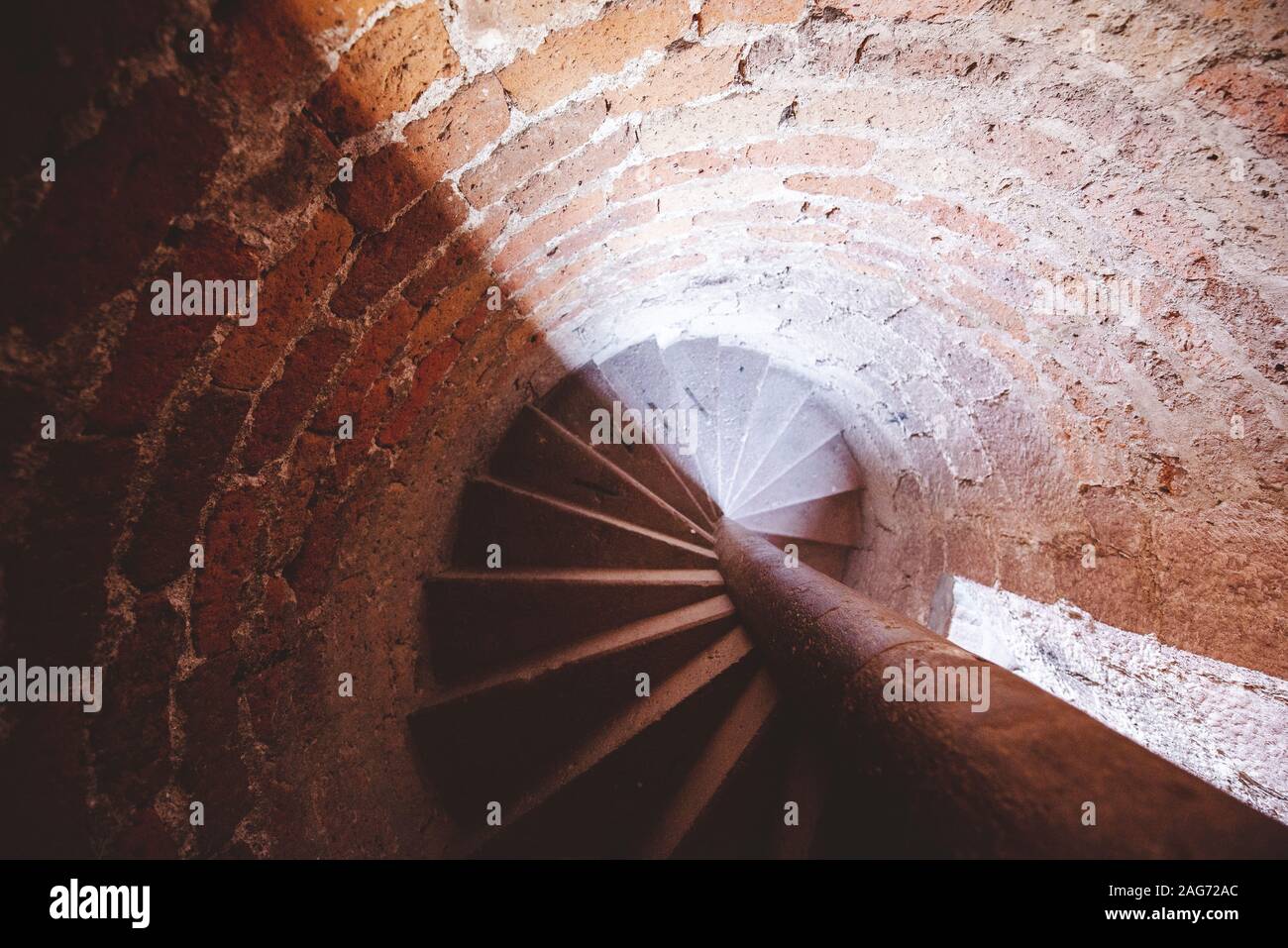 Overhead shot of a spiral staircase in a brick tower Stock Photo - Alamy