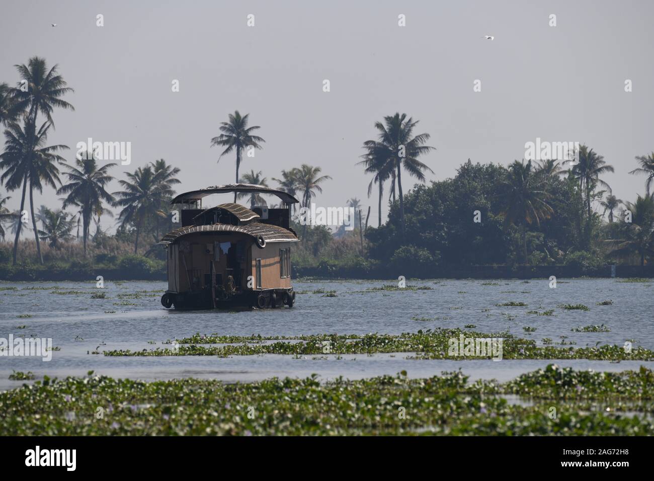 Kerala backwaters. Houseboat on lake Vembanad in Kerala, India Stock ...
