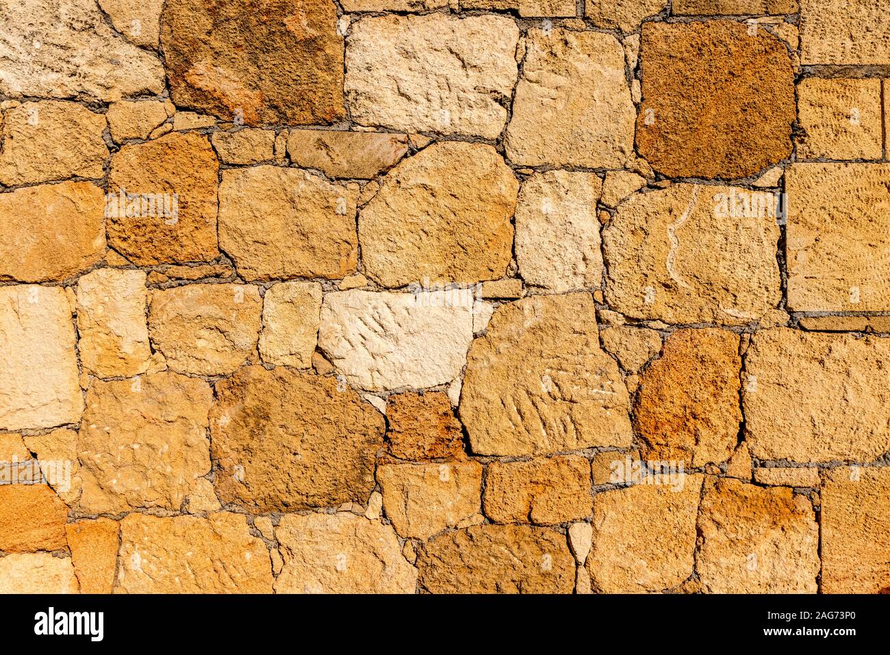 Background of ancient stone wall. Texture of old brick Stock Photo - Alamy
