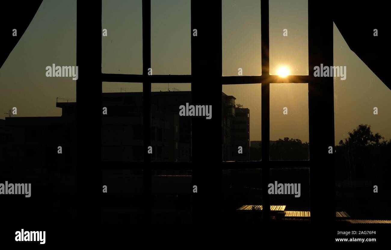 morning sun sunlight light ray through window Stock Photo - Alamy