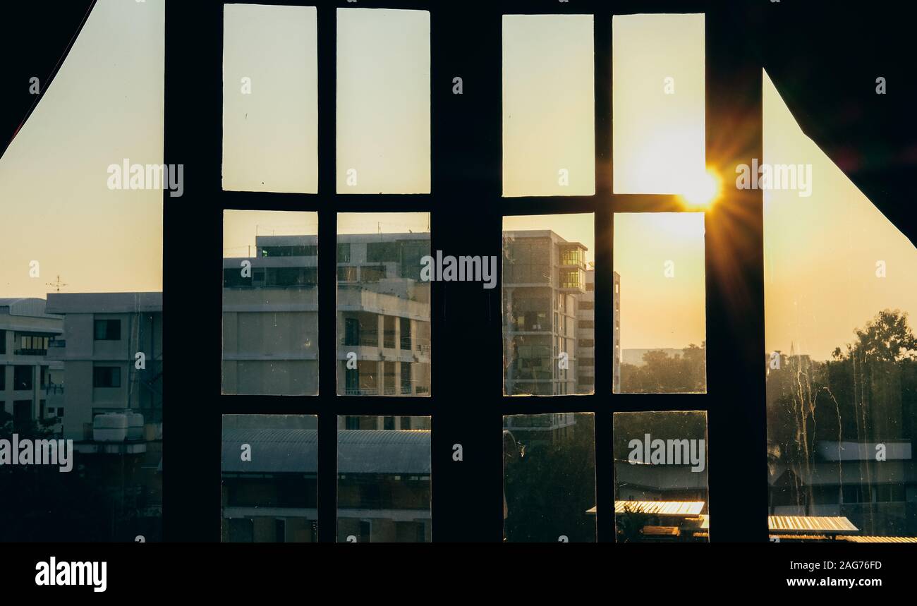morning sun sunlight light ray through window Stock Photo - Alamy