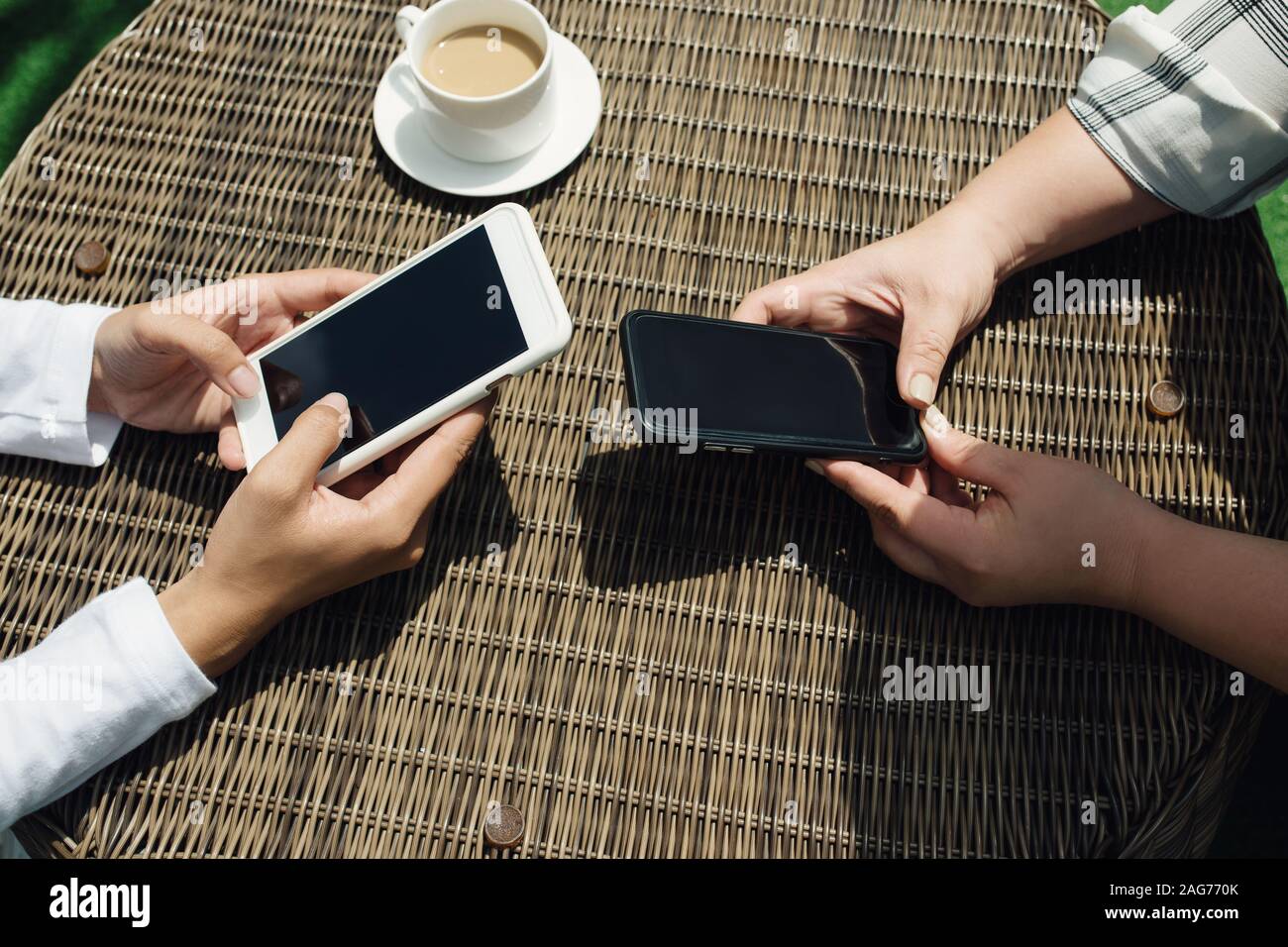 Using two hands hi-res stock photography and images - Alamy