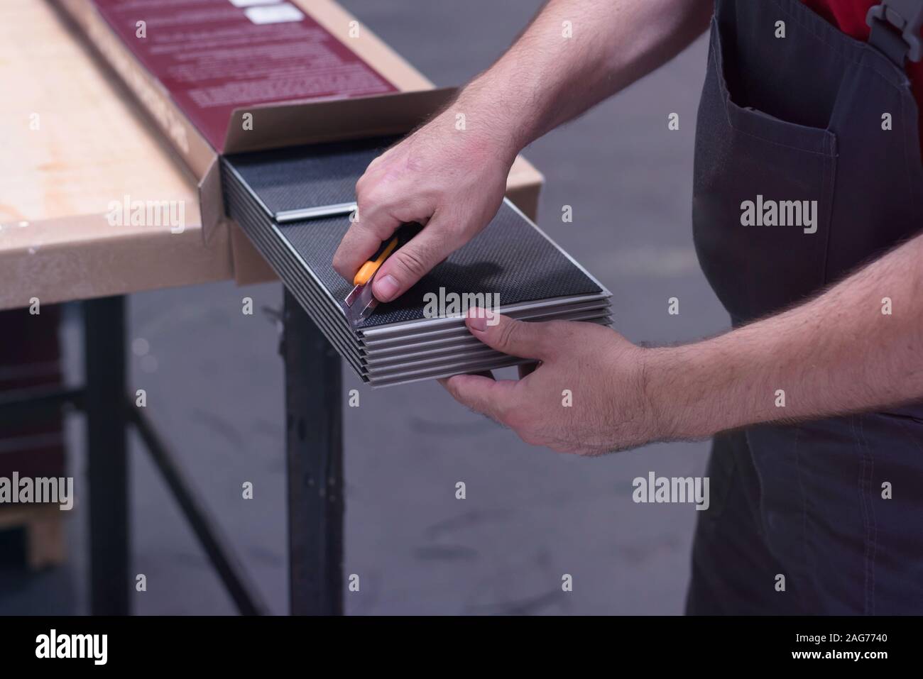 Worker in his carpenter workshop standing proud in front of the ...