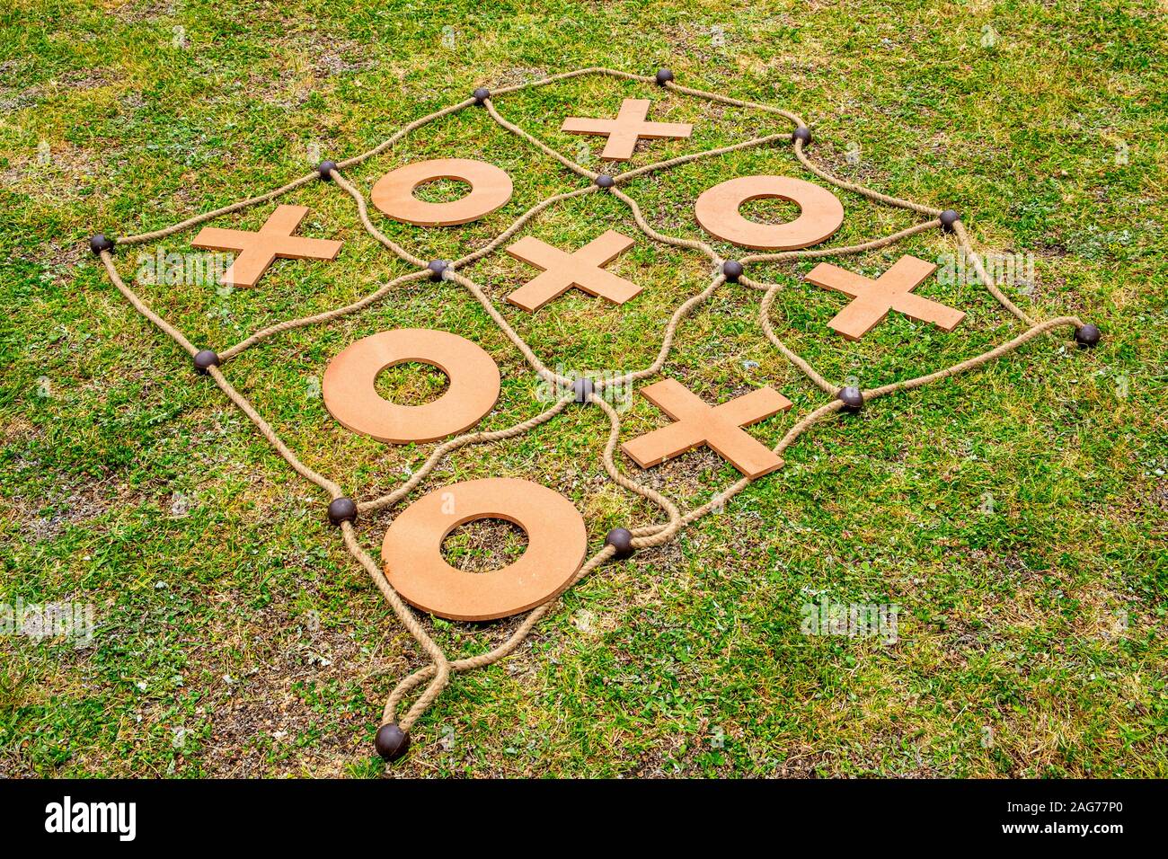 Large tic tac toe yard game placed on the grass Stock Photo - Alamy