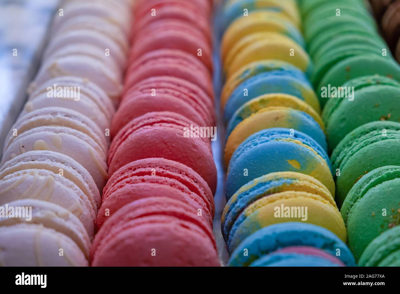 Rows of colorful French macarons with shallow focus Stock Photo - Alamy