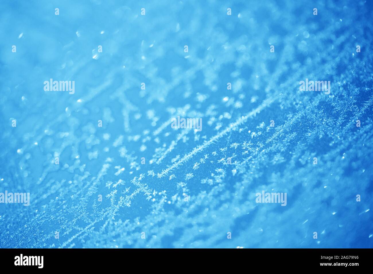 Bright background with frozen snowflakes in the early morning Stock ...