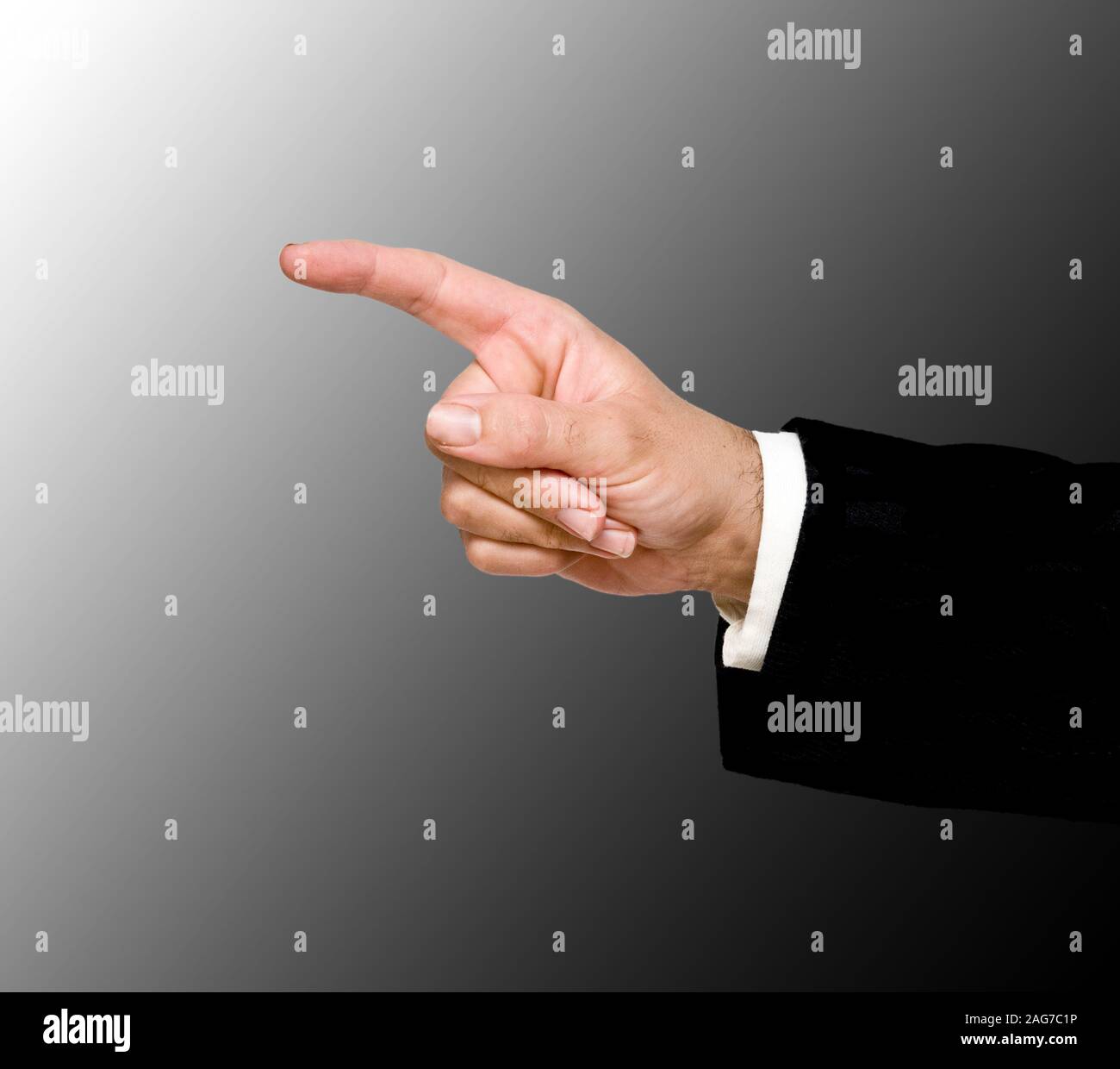 Hand pointing to left Stock Photo - Alamy