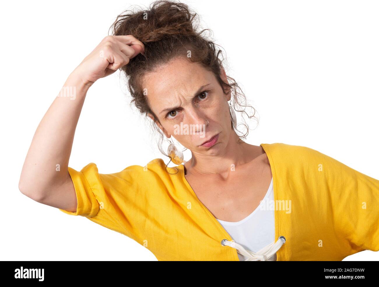 Confused beautiful girl scratches head, isolated on white background ...