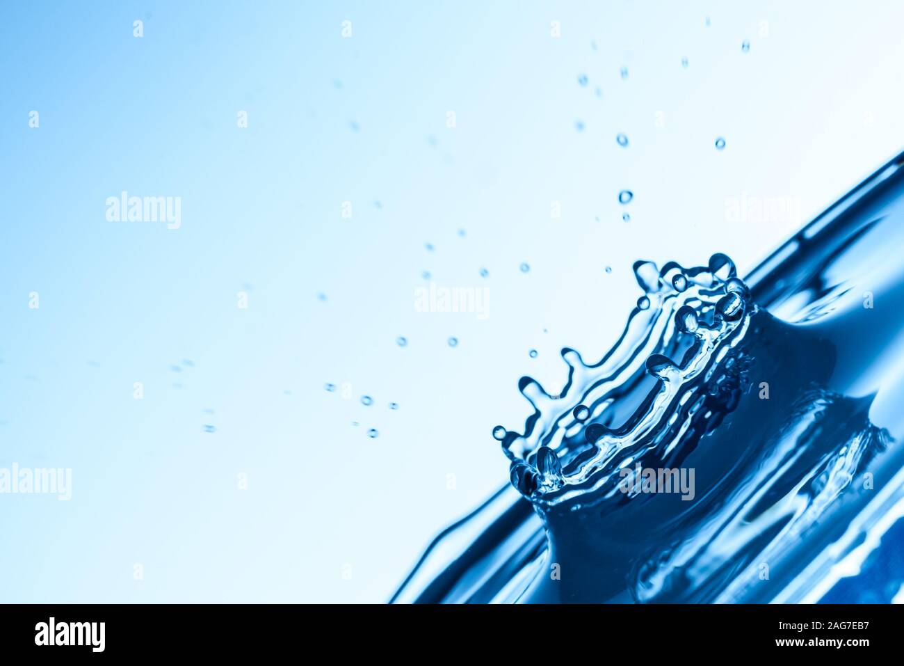 Water drop fall into water Stock Photo - Alamy