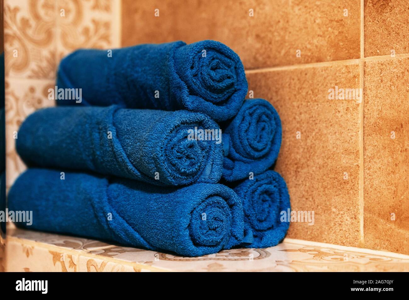 Rolled up towels in bathroom hi-res stock photography and images - Alamy