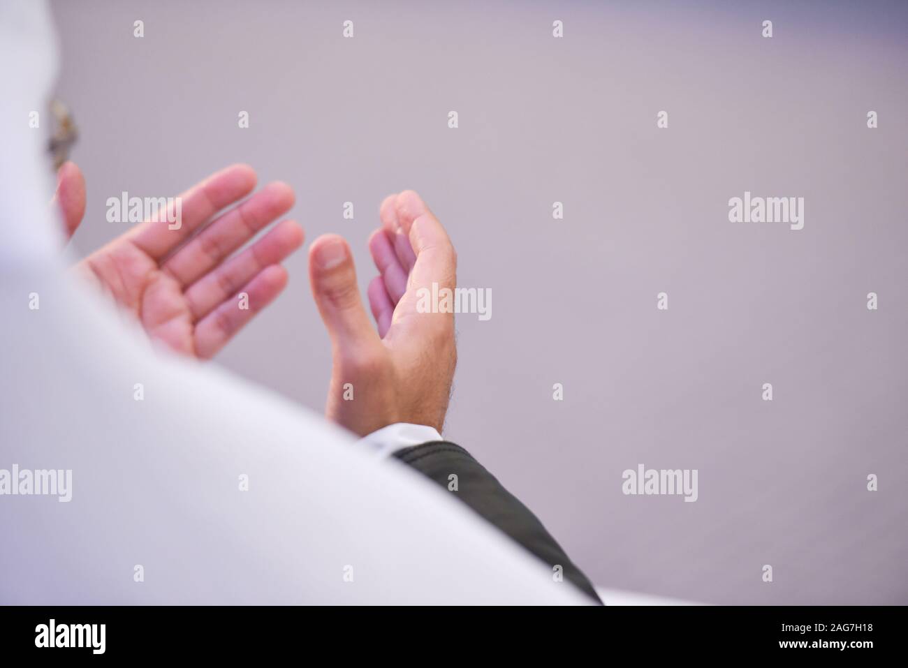 Elderly Muslim Arabic man praying during islamic conference Stock Photo ...