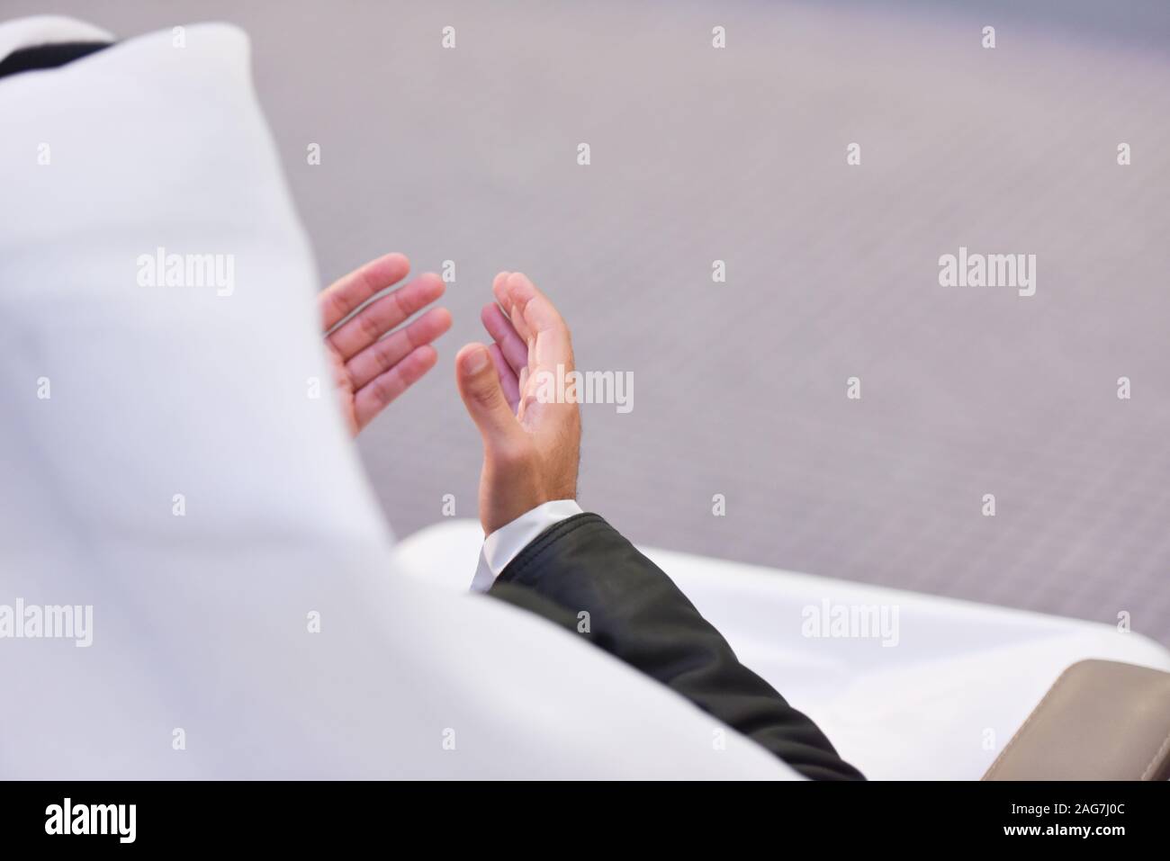 Elderly Muslim Arabic man praying during islamic conference Stock Photo ...