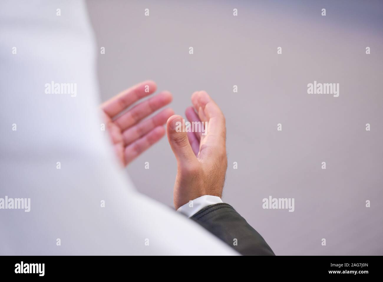 Elderly Muslim Arabic man praying during islamic conference Stock Photo ...