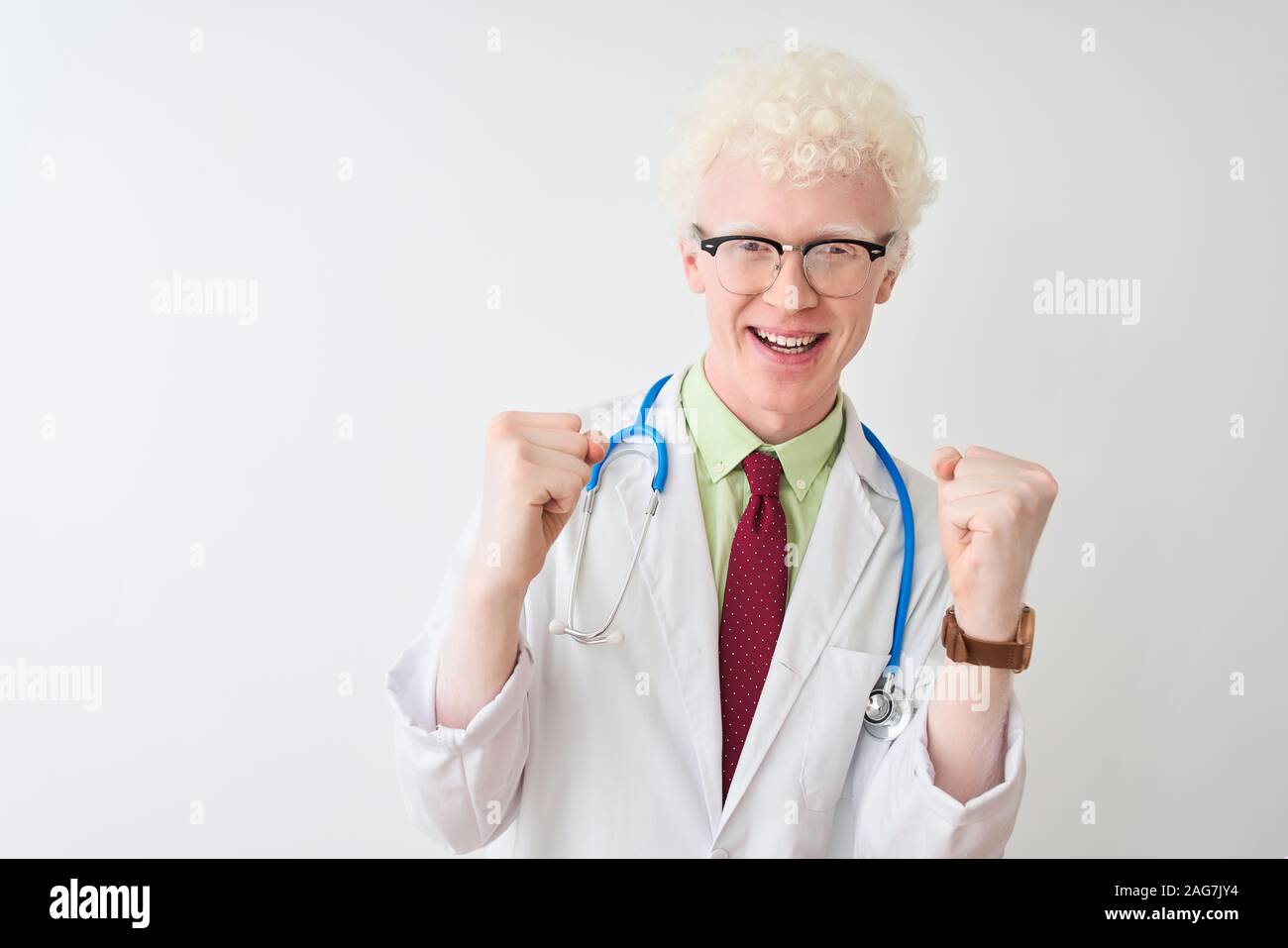 Young albino doctor man wearing stethoscope standing over isolated ...