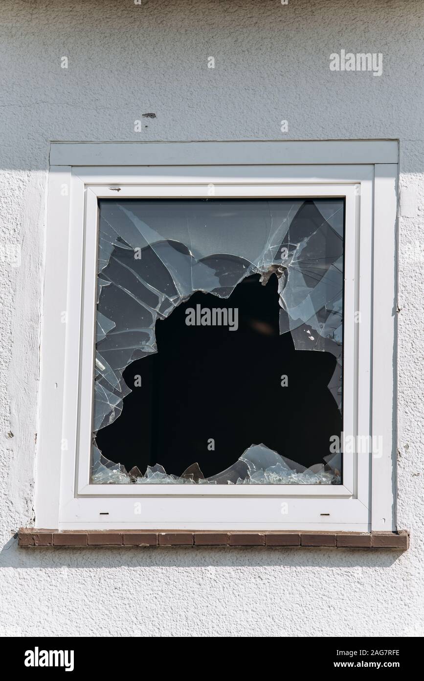 Broken Windows in the house. Shards of glass remained in the window ...