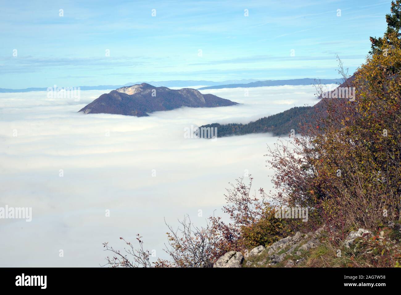 Mount Veyrier above the sea of clouds above Annecy lake Haute-Savoie ...