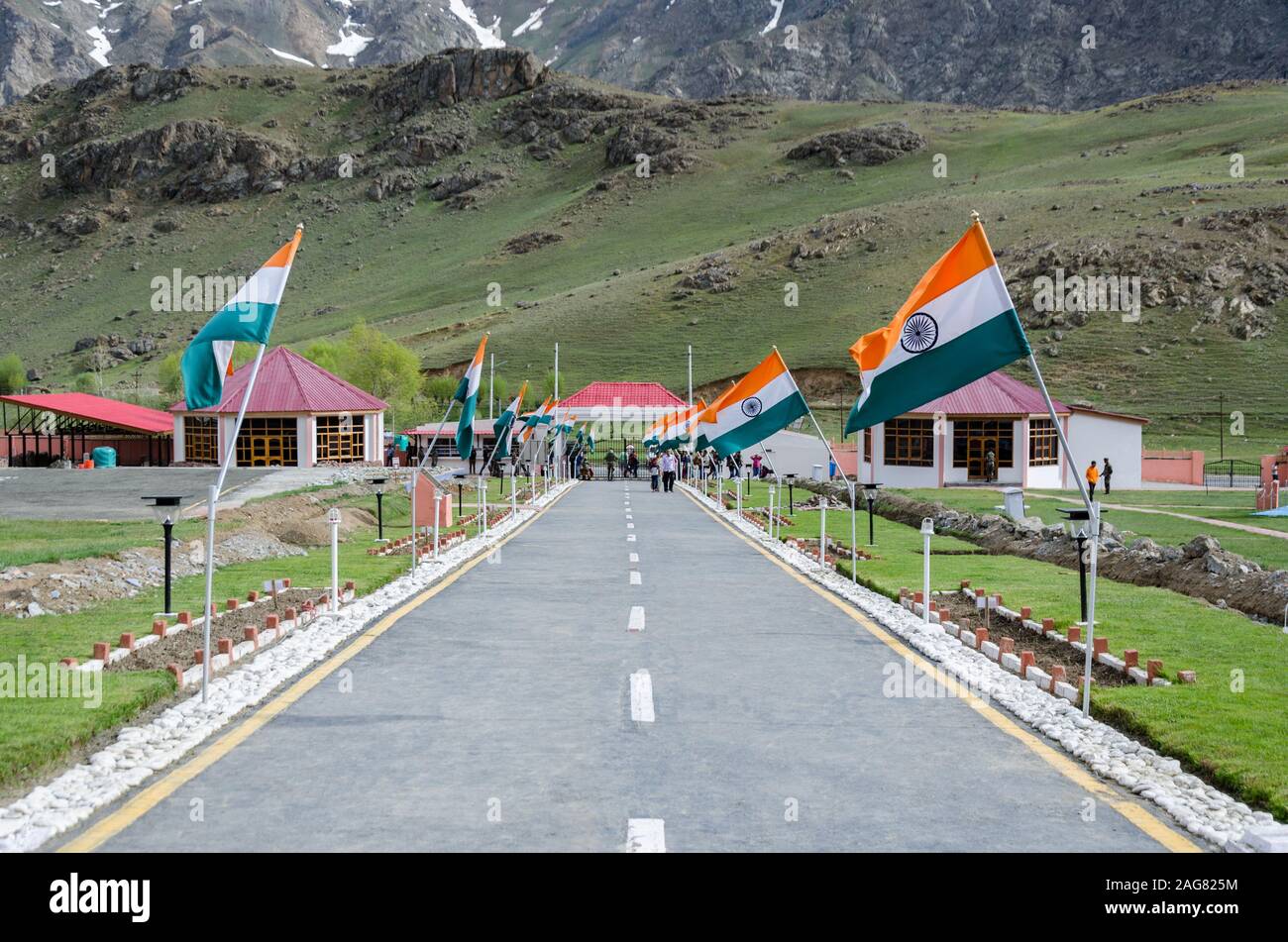 View of the flag lined walking path in front of Kargil War Memorial in ...