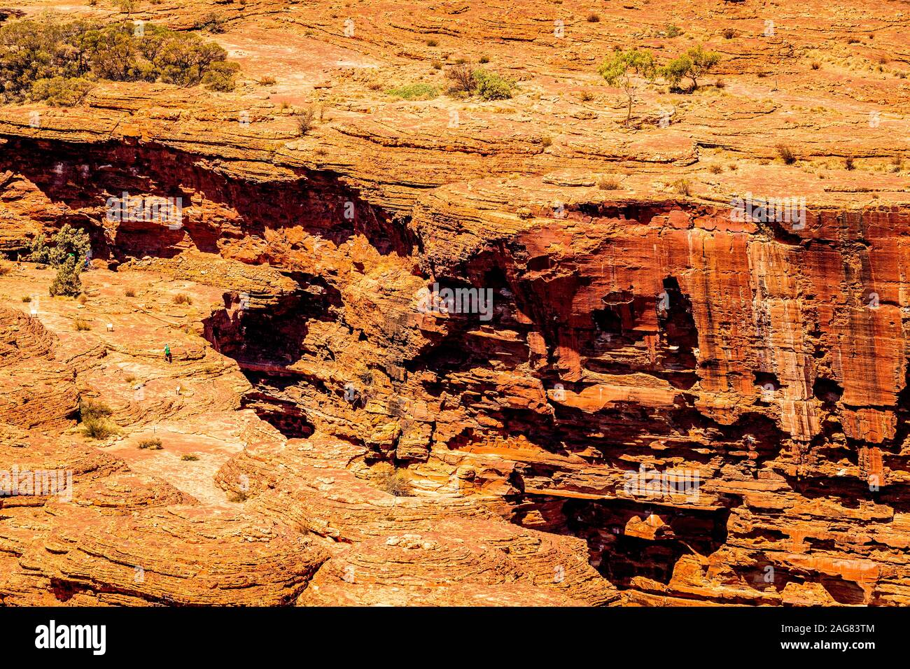 The walls at Kings Canyon are composed of layers of Mereenie and the ...