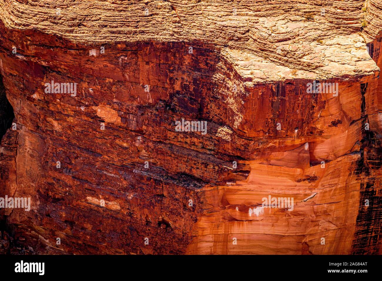 The walls at Kings Canyon are composed of layers of Mereenie and the ...