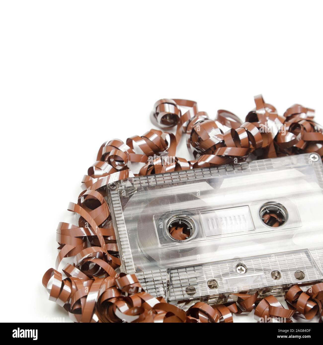 Vintage transparent Compact Cassette with pulled out tape on white ...