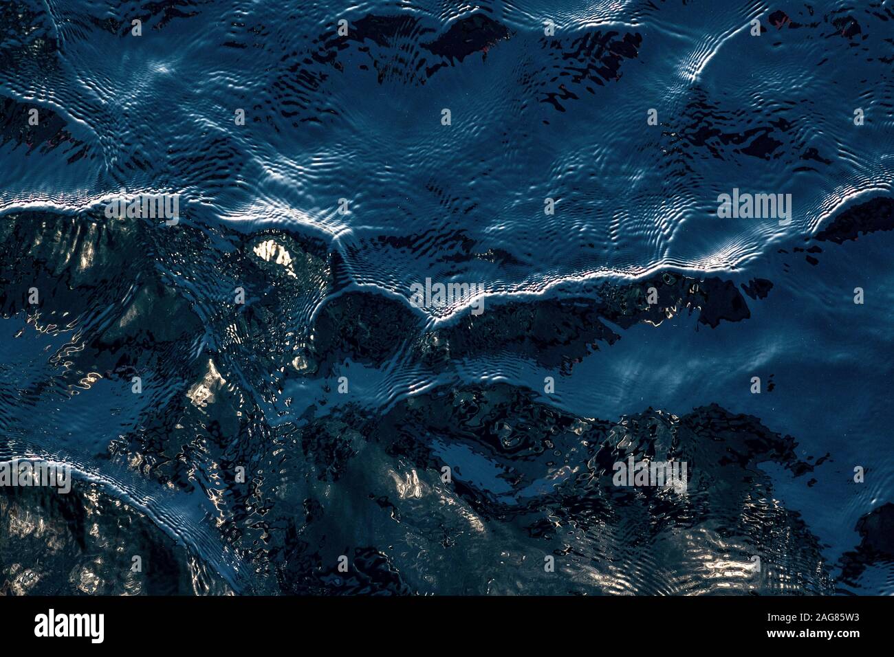 Blue sea water background gentle waves Stock Photo - Alamy