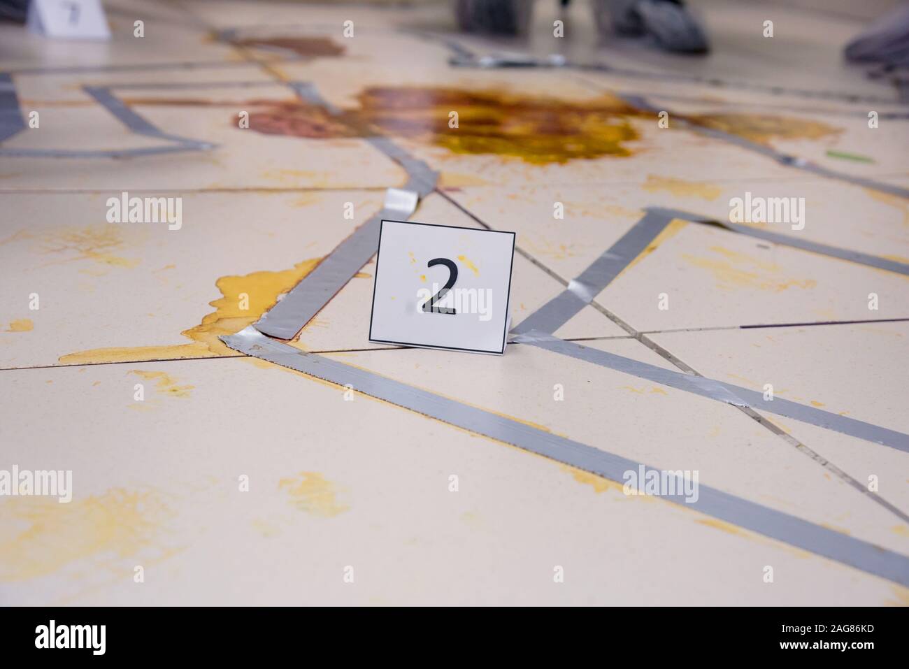 Forensic technicians taking DNA sample from blood stain with cotton ...