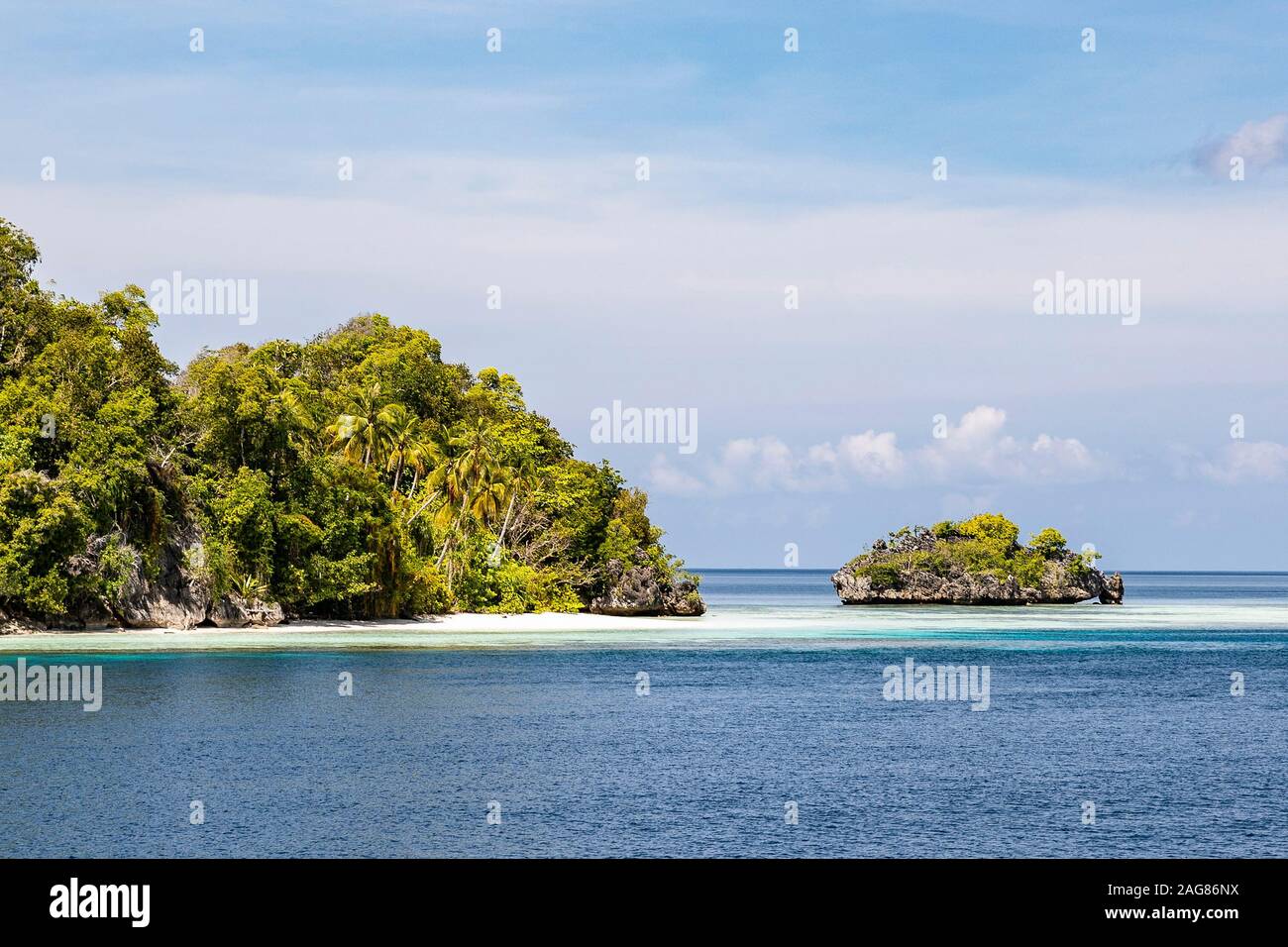 Tropical islands with ocean foreground Raja Ampat, Indonesia Stock ...