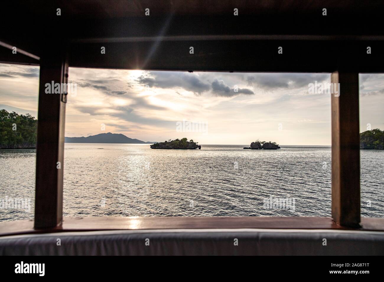 Raja Ampat Indonesia islands through boat frame Stock Photo - Alamy