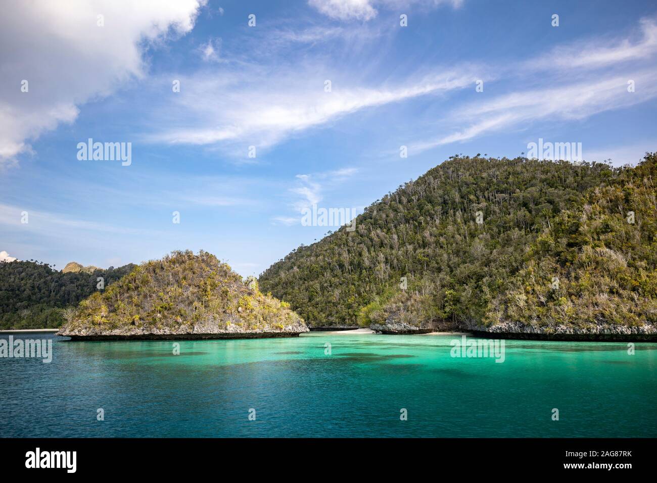 Tropical islands with ocean foreground Raja Ampat, Indonesia Stock ...