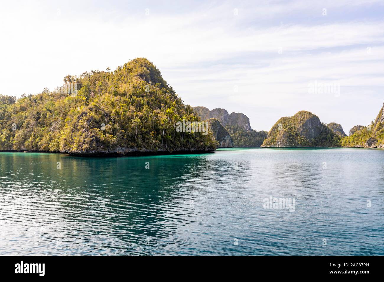 Tropical islands with ocean foreground Raja Ampat, Indonesia Stock ...