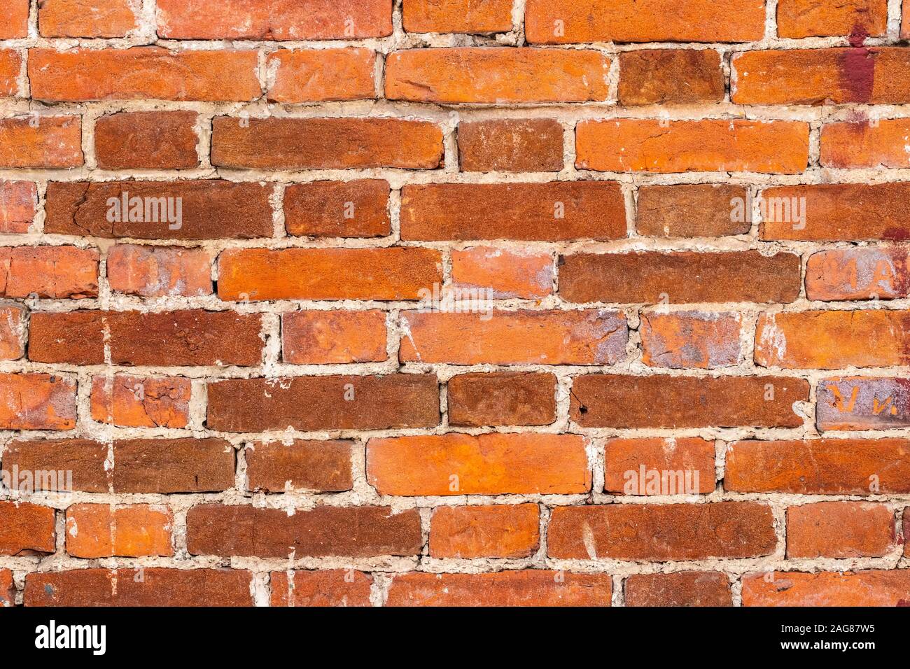 Background of old red stone wall. Texture of brick Stock Photo - Alamy