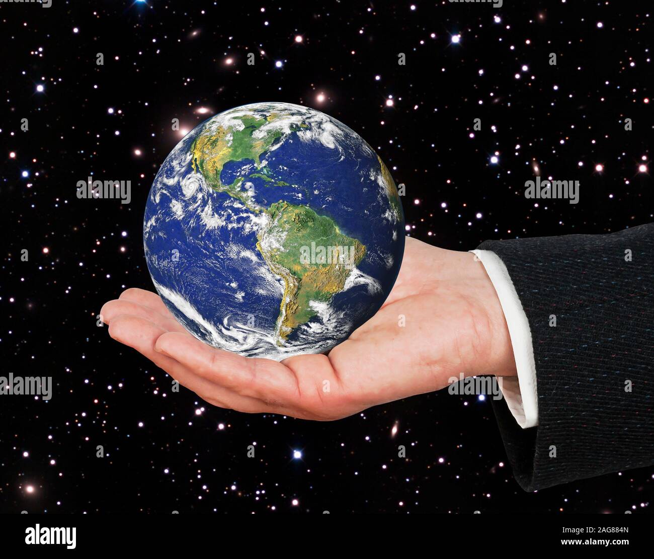 Planet earth on palm.Elements of this image furnished by NASA Stock ...
