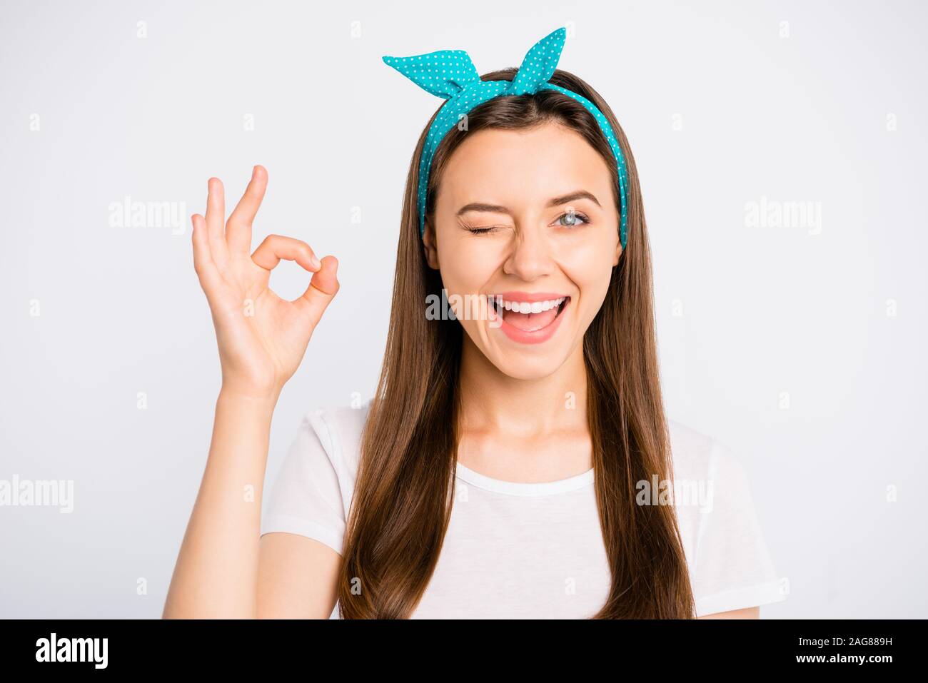 Close up photo of positive cheerful funky girl have fun show ok sign ...