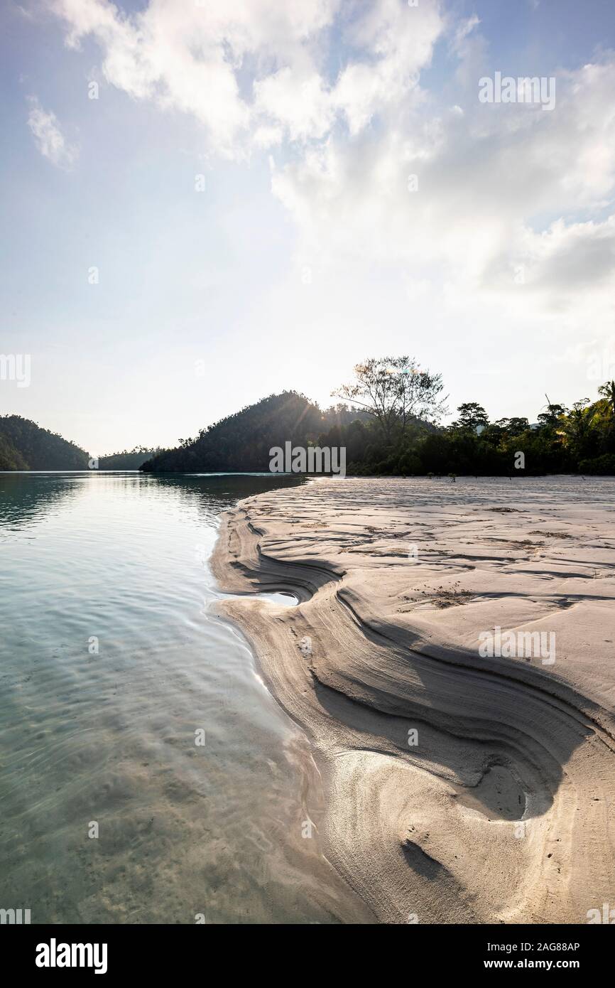 Sandy bank ocean inlet, Raja Ampat, Indonesia Stock Photo - Alamy