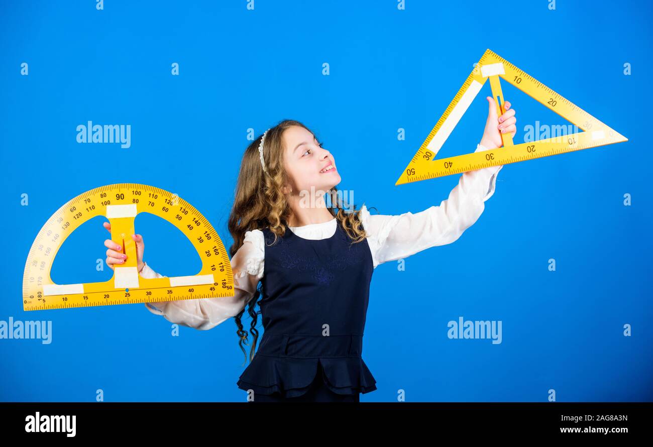 Kid school uniform hold ruler. School education concept. Sizing and ...