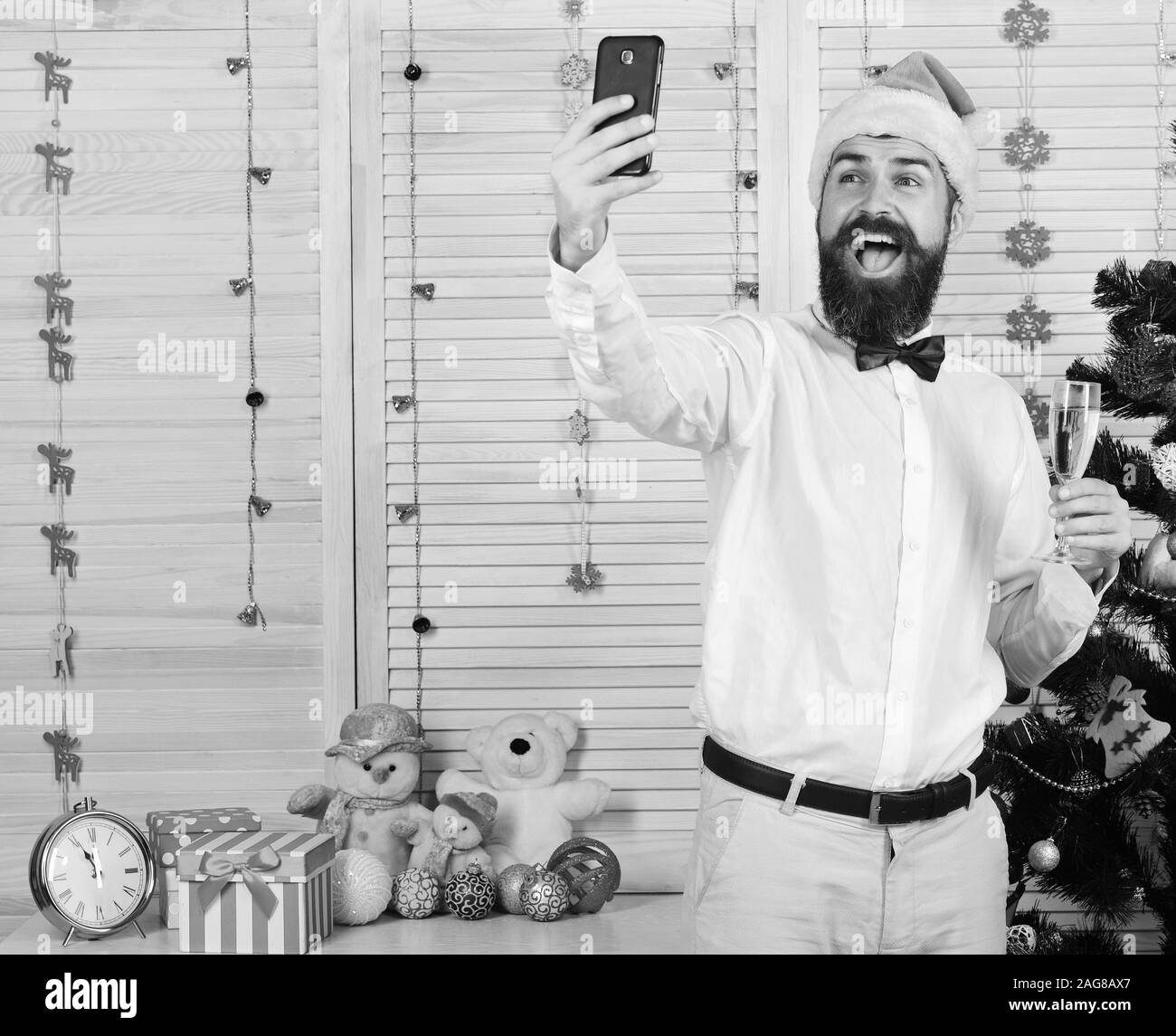 Christmas happy man phone Black and White Stock Photos & Images - Alamy