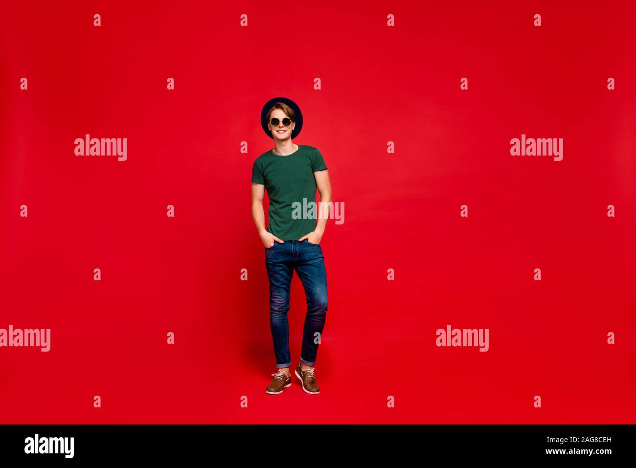 Full length photo of positive cheerful guy in blue hat real wealthy ...