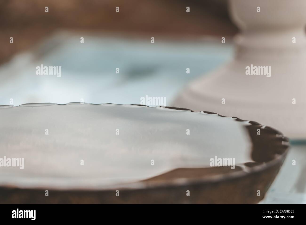 Water reflecting on a full bowl Stock Photo - Alamy