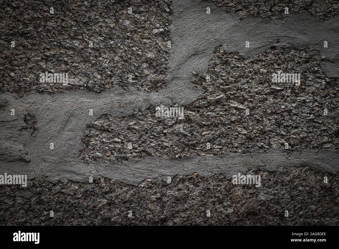 A wall of stone and cement Stock Photo - Alamy