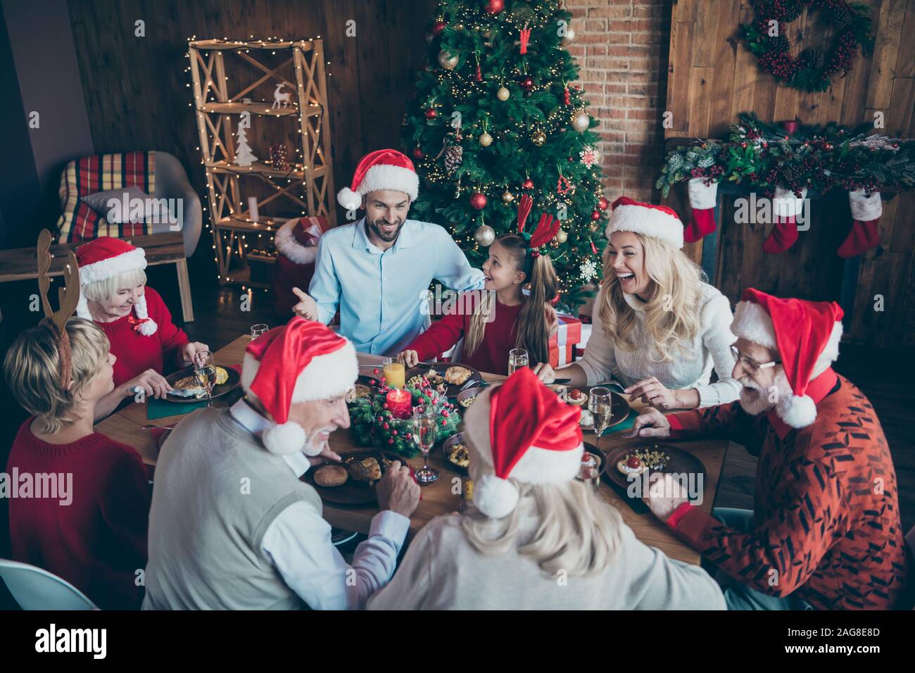 Merry christmas large family reunion gathering meeting sit table have x ...