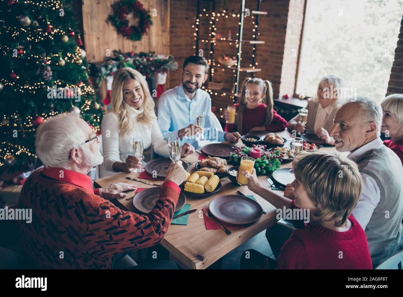 Nice lovely friendly idyllic cheerful cheery big full family spending ...